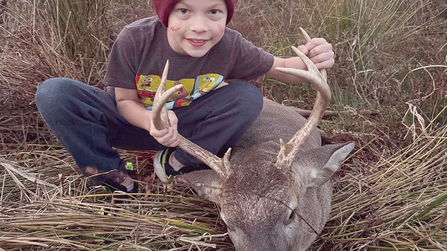 Brown bags first buck