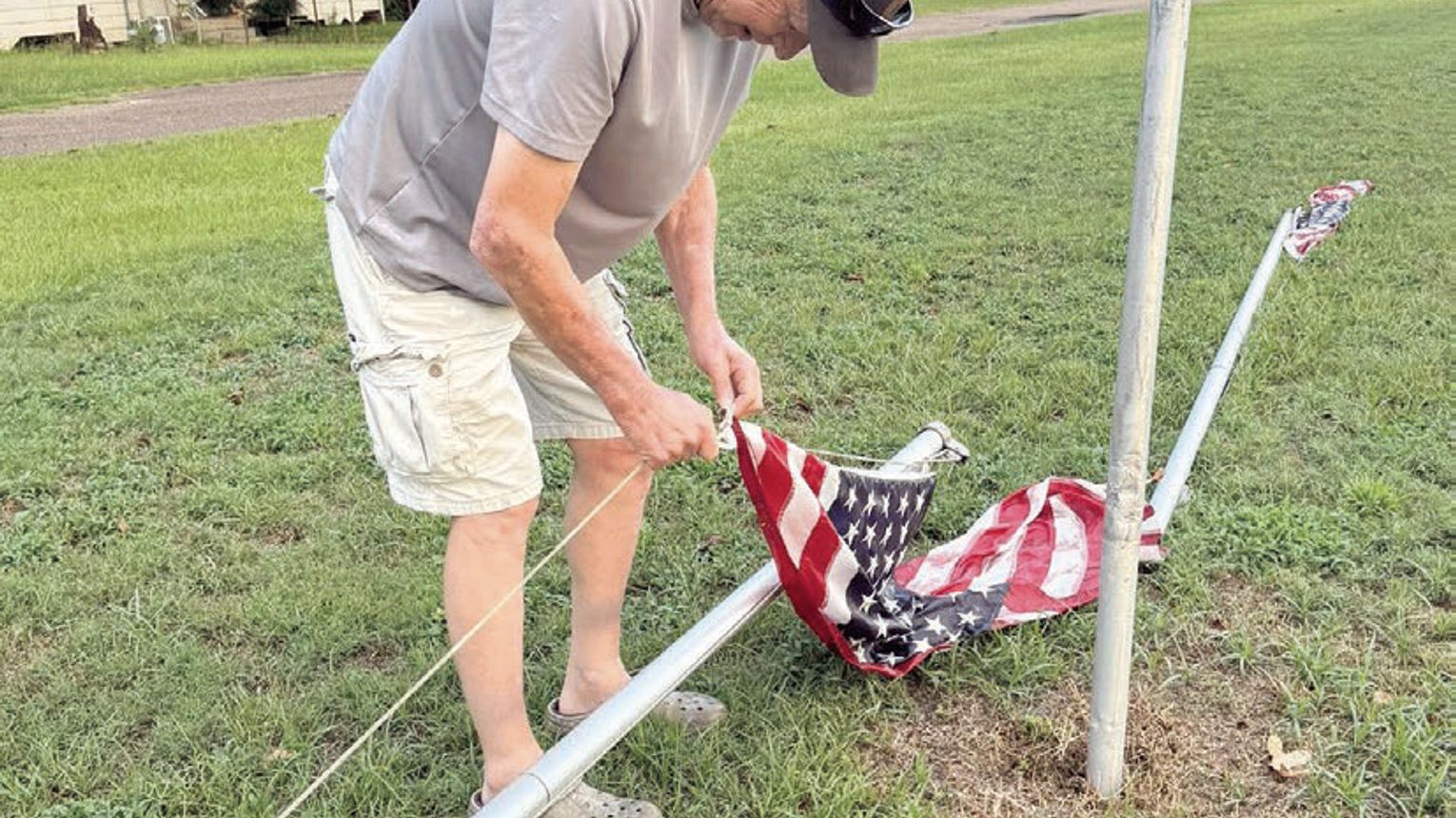 Storms damage flag poles officer memorial in Mangham
